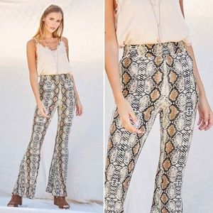 entro | Pants & Jumpsuits | New Arrivalreptile Print Flared Pants ...
